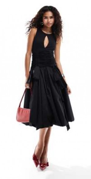 Amy Lynn - Bodhi slash cut out bubble midi dress in black