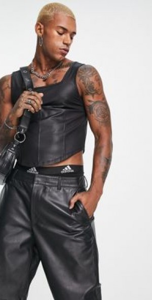 ASOS DESIGN - skinny crop tank top in black coated texture with corset ...