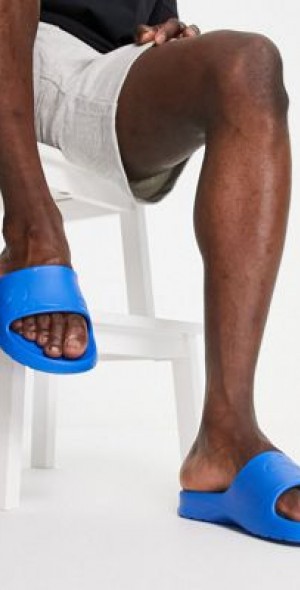 Lacoste - Croco 2.0 color block slides in blue